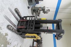 Machines Used | Caterpillar Model NR4000 Standing Type Electric Forklift