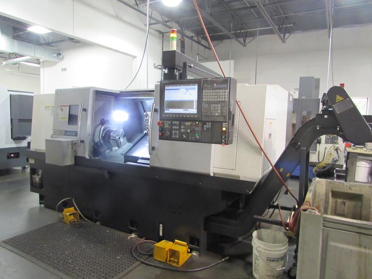 Okuma Genos L400E 2-Axis CNC Lathe With 10" Chuck, Tailstock, Chip ...