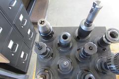 Machines Used | (14) Assorted Cat 40 Tool Holders with Huot Rack