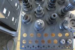 Machines Used | (14) Assorted Cat 40 Tool Holders with Huot Rack