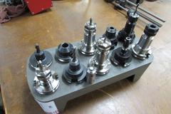 Machines Used | (10) Assorted Cat 40 Tool Holders with Rack. End Mill ...