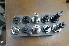Machines Used | (10) Assorted Cat 40 Tool Holders with Rack. End Mill ...