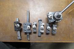 Machines Used | Aloris BXA Tool Post with (7) Slide-On Holders