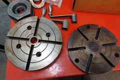Machines Used | Two Round T-Slotted Plates with various Hex Nuts