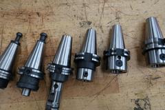 Machines Used | Tool Holders, Assorted: (2) Shell Mill Cat 40, (1) Twin ...