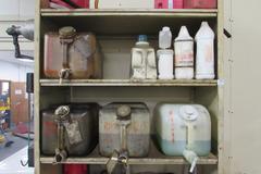 Machines Used | Shelving Unit with COntents of Lube and Cutting Oils