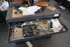 Machines Used | Metal Table with Drawer with Misc Contents