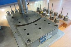 Machines Used | 3 Small Hand Tapping Stations, 2 with Chucks