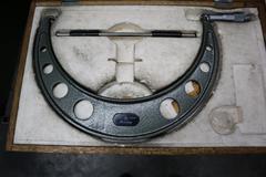Machines Used | Mitutoyo Micrometers (6) in Wood Boxes