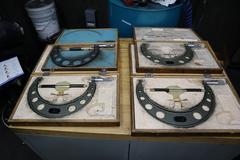 Machines Used | Mitutoyo Micrometers (6) in Wood Boxes