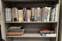 Machines Used | Metal Book Shelves with Books