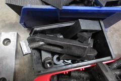Machines Used | Bins of Step Clamp Hardware, Studs, Nuts, Risers